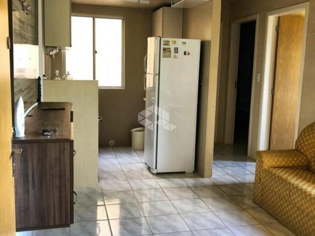 Apartamento semi mobiliado de 2 quartos com garagem na Lomba do Pinheiro