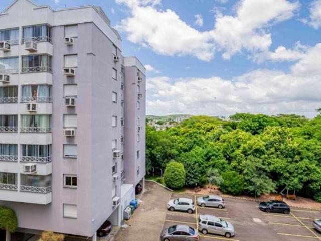 Apartamento semi mobiliado de 3 quartos, elevador, 1 vaga no bairro Cavalhada
