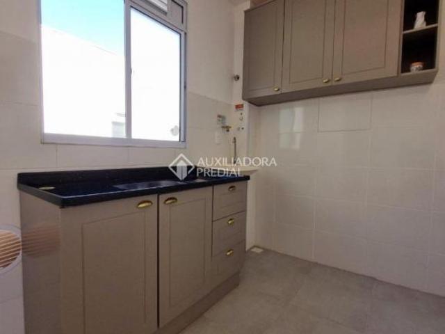 Apartamento semi mobiliado no bairro Santos Dumont