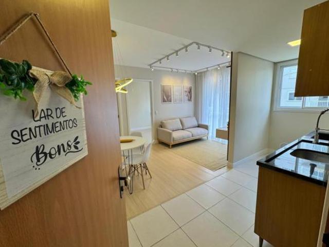 Apartamento semimobiliado à venda, Novo Hamburgo, com sacada e portaria 24h