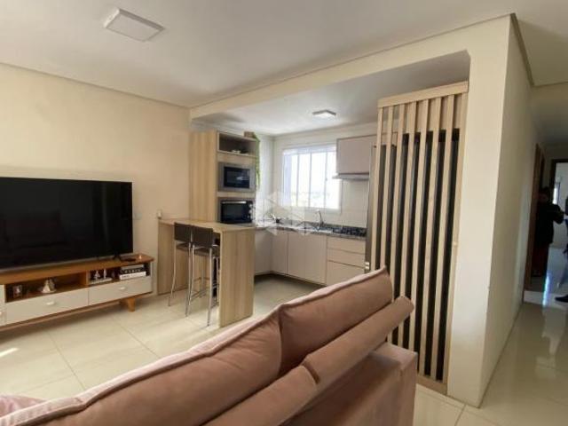 Apartamento semimobiliado à venda no bairro Santa Rita, Guaíba RS. 2 dormitórios, 1 banheiro, sala d