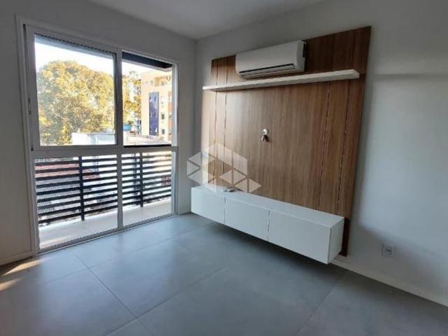 Apartamento semimobiliado, com 02 dormitórios, no Centro
