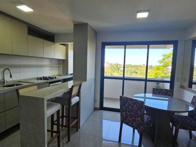 APARTAMENTO SEMIMOBILIADO COM 1 SUÍTE 1 VAGA DE GARAGEM CONDO