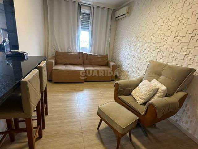 Apartamento semimobiliado com 2 dormitórios no bairro Humaitá COD: 23554