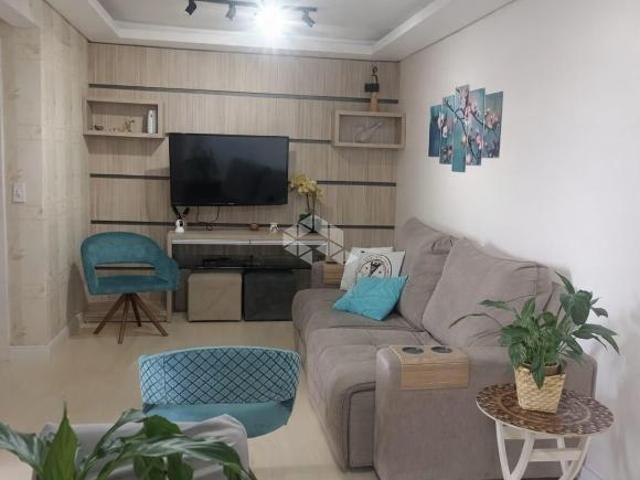 Apartamento semimobiliado com de 02 dormitórios no centro