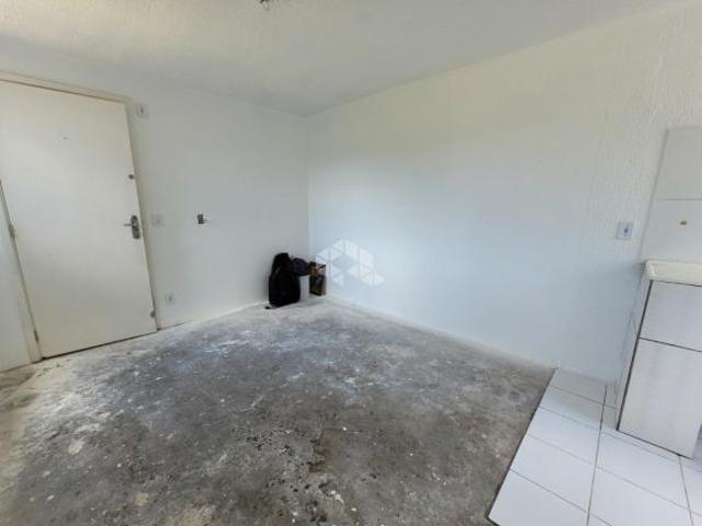 Apartamento semimobiliado de 2 dormitórios com vaga de garagem!