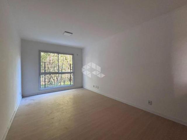 Apartamento semimobiliado de 2 dormitórios, sendo 1 suíte, próximo à UNISC