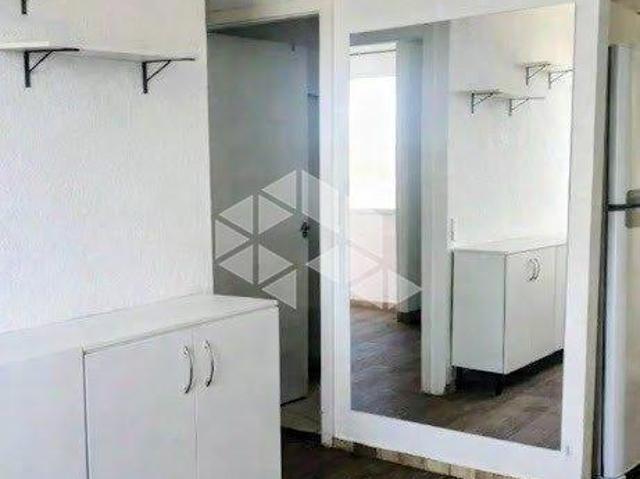 Apartamento semimobiliado de 2dormitórios na zona sul