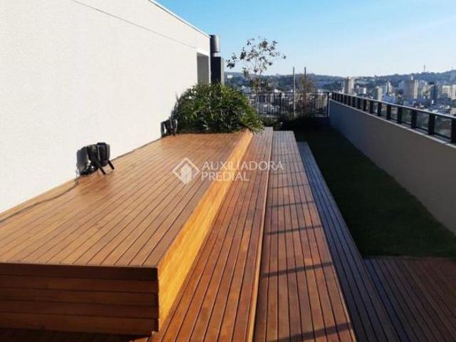 Apartamento semimobiliado em condominio fechado 1 dormitório vaga de garagem