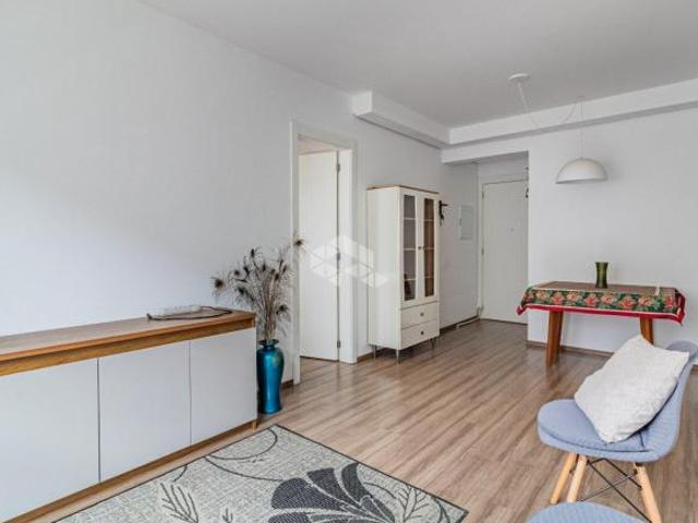 Apartamento SEMIMOBILIADO 1 dormitório/Quarto. Churrasqueira. Vaga Escriturada