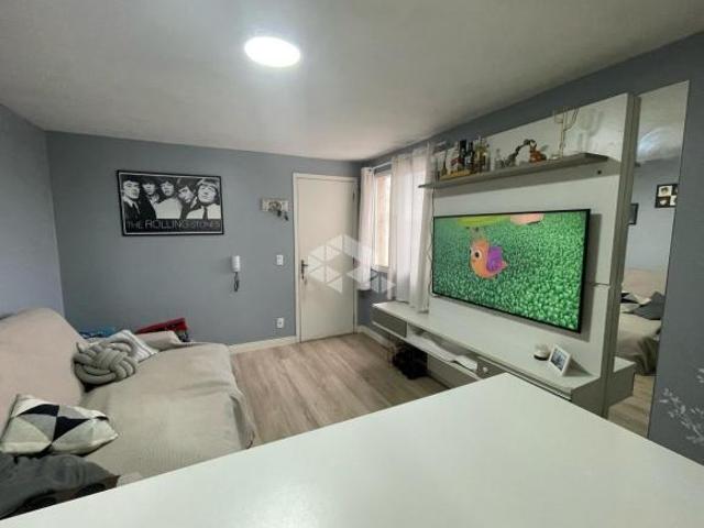 Apartamento semimobiliado, 2 dormitórios, 1 vaga de garagem fixa. Olimpica Esteio