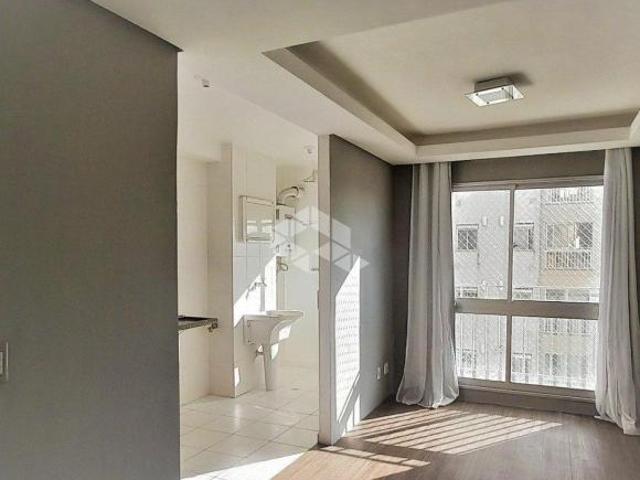 Apartamento semimobiliado, 2 dormitórios, 1 suíte, 1 vaga