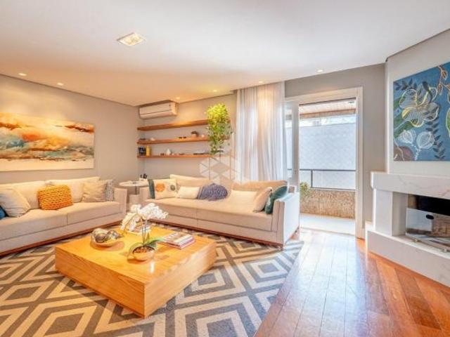 Apartamento semimobiliado 3 suítes e 2 vagas no bairro Petrópolis