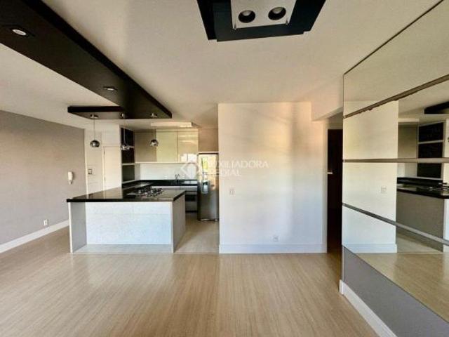 Apartamento semimobiliado, 75m², 2 dormitórios, sendo 1 suite, próximo ao Shopping Villagio Caxias