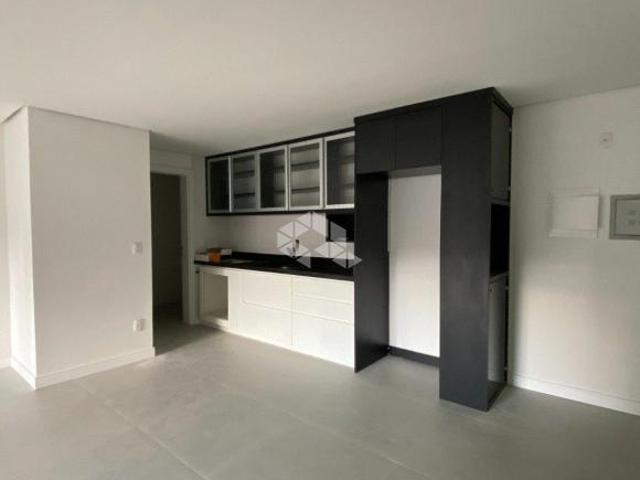 Apartamento studio 1 suíte, com 62,96m² privativos, uma vaga de garagem, no Bairro Moura