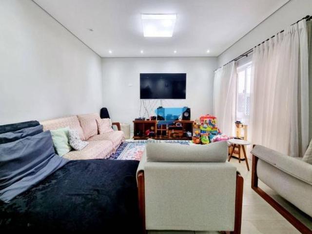 Apartamnto refromado à venda na praia das Pitangueiras no Guarujá I Omega Imoveis