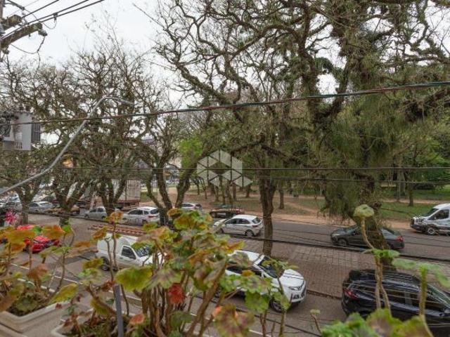 Apto a venda de 3 dormitórios, 1 suíte e vaga em frente a Praça da Redenção