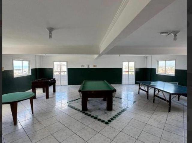 Apto com sacada, elevador e garagem na Cidade Ocian, Praia Grande R$ 265.000