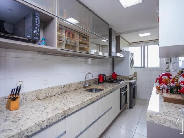 Apto de 3 dorm com garagem no centro de SL
