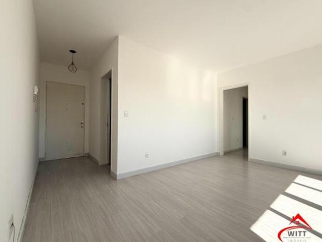 APTO TÉRREO COM 02 DORM. SENDO UMA SUÍTE. 02 VAGAS DE GARRAGEM ÁREA PRIV. 80,54