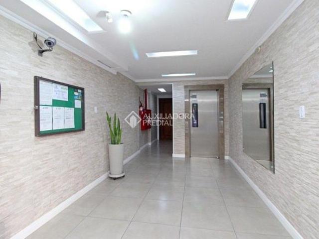 APTO 01 DORM. LIVING AMPLO EM RUA ARBORIZADA