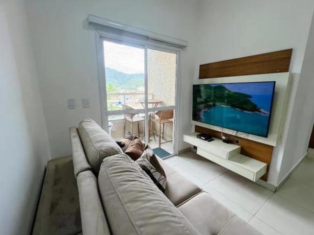 Apto 2 dorms com suíte, 54 m2, com churrasqueira 2 vagas mobiliado em Ubatuba