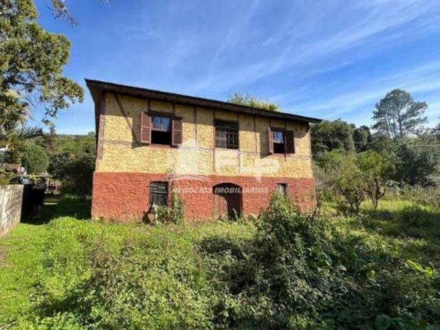 ÁREA COM CASA CENTENÁRIA NAS MARGENS DA RS 452