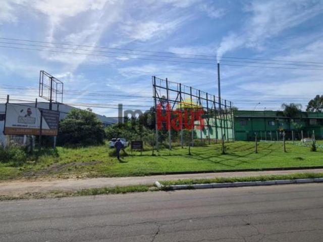 Área de terra na beira da ERS 115