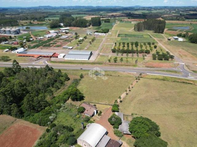 Área de terras com casa de 04 dormitórios e galpão/pavilhão