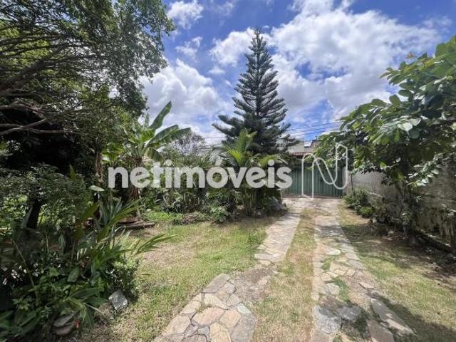 Área / Lote com casa – Paquetá