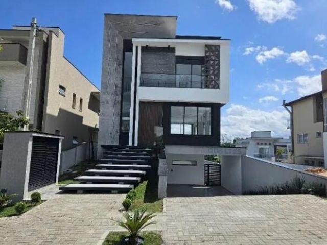 Aruã Brisas 1 Sobrado de Alto Padrão no Cond. Aruã Brisas | 3 Suítes e Piscina com Borda Infinita