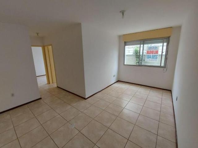 ATENÇÃO CAMPOS VELHO CONDOMINIO COM OTIMA ESTRUTURA APTO. TERREO 2 DORM. COM BOX