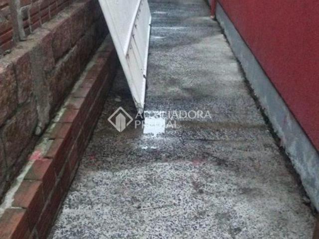 Auxiliadora Predial Canela vende casa três dormitórios