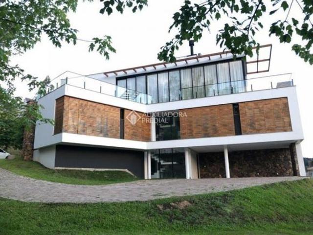 Auxiliadora Predial Canela vende com exclusividade: Casa de 04 suítes em Alphaville Gramado