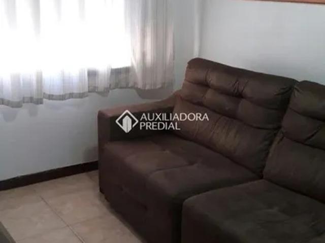 AUXILIADORA PREDIAL, VENDE: Apartamento 2 dormitórios, sala de estar, cozinha, área de serviço e ban