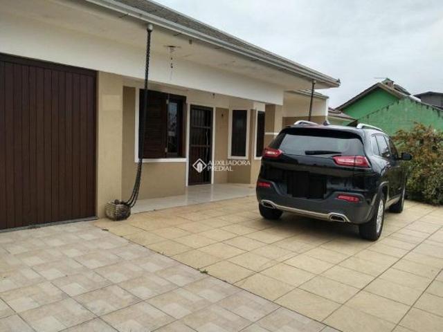 Auxiliadora Predial vende casa 4 dorm. mobiliada com 135,47m², próxima ao mar na praia Atlântida Sul