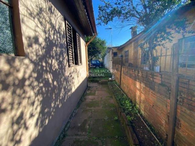 Auxiliadora Predial vende casa com três dormitórios, com 173m² Scharlau