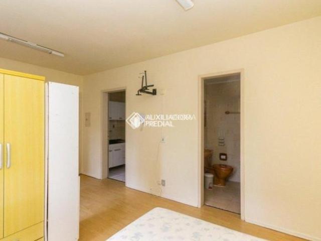 Auxiliadora predial vende JK, dormitório e living conjugados, área de serviço,banheiro social com b