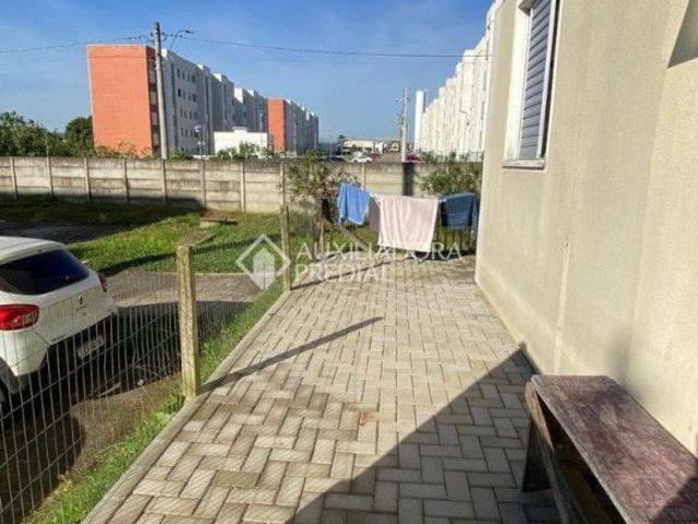 Auxliadora Predial vende Apartamento 2 dormitórios térreo com pátio