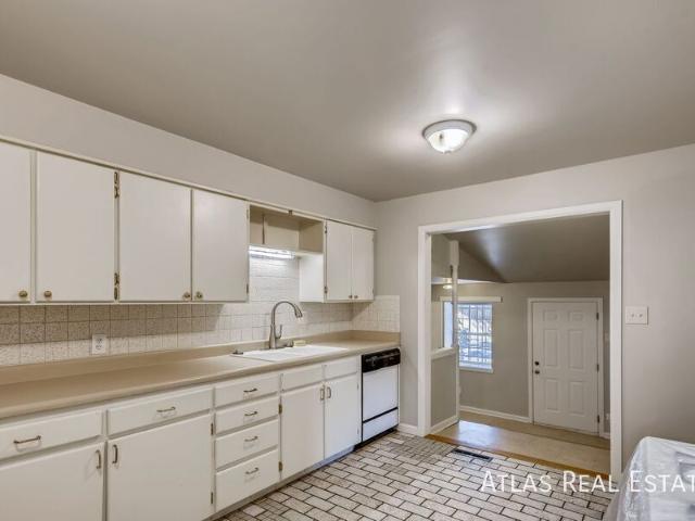 Free shared Dish TV and internet included! Beautiful 3 bed 1 bath in Quiet Tri plex with Amazing Lot in Two Creeks!