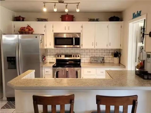 AVAILABLE NOW! Magical 4/3 Canal Home with Mother In Law Unit.