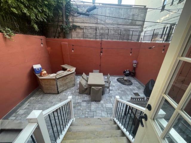 Backyard and Block from Domino Park