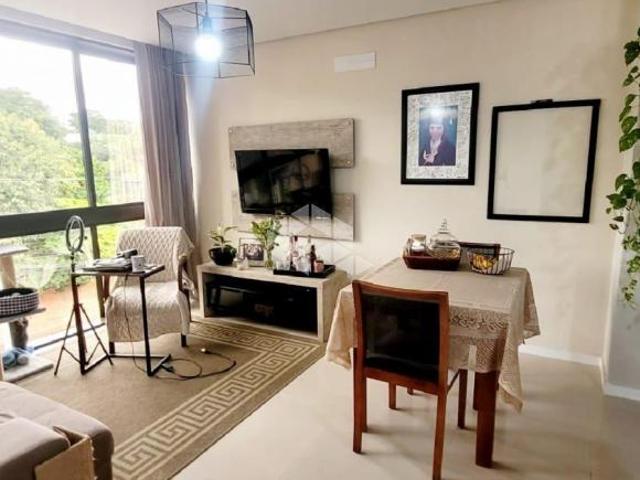 Baixou valor! Apartamento de 1 dormitório com garagem no bairro Menino Deus
