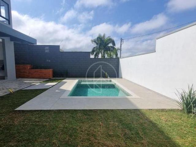 Bairro São Pedro / Linda casa linear em condomínio fechado Quintal aconchegante com piscina!
