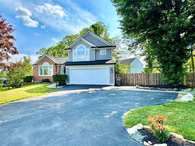 Beautiful Home with Deck, Fireplace & Finished Lower Level!