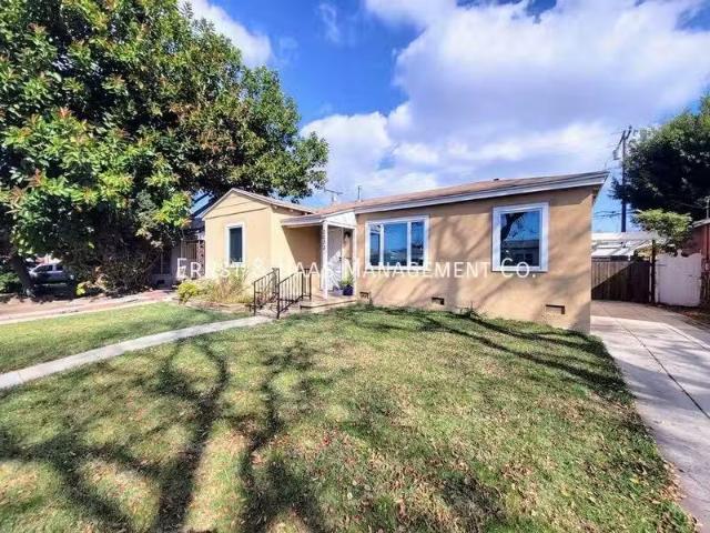 Beautiful Long Beach Home Recently Remodeled with a HUGE Rear.
