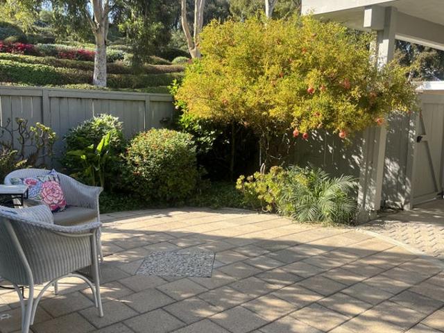 Beautiful room looking over private flowered patio