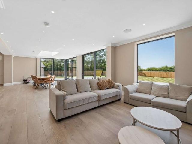 Beautifully appointed contemporary residence with countryside views, positioned on one of Wilmslow's premier roads