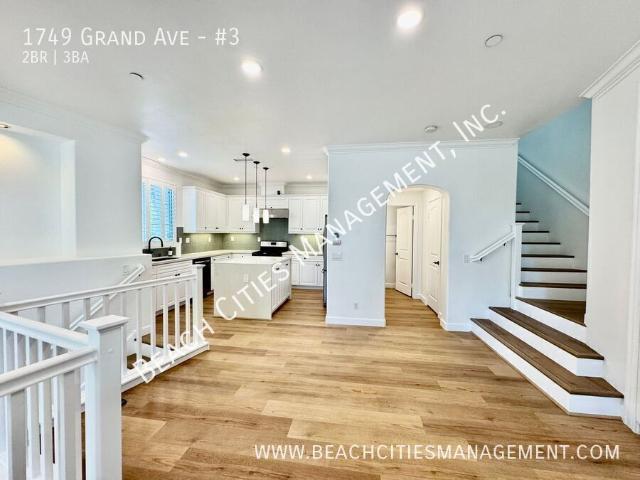 Beautifully Remodel Townhouse with AC & Two Car Garage!