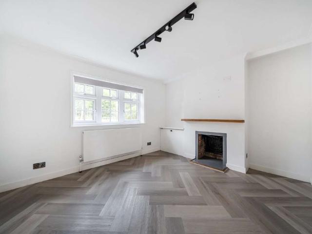 Beautifully refurbished village cottage with south facing garden and parking